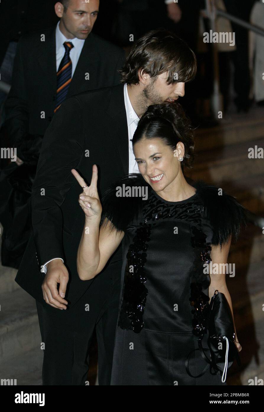 U.S. actress Demi Moore, right, gestures as she arrives with her ...