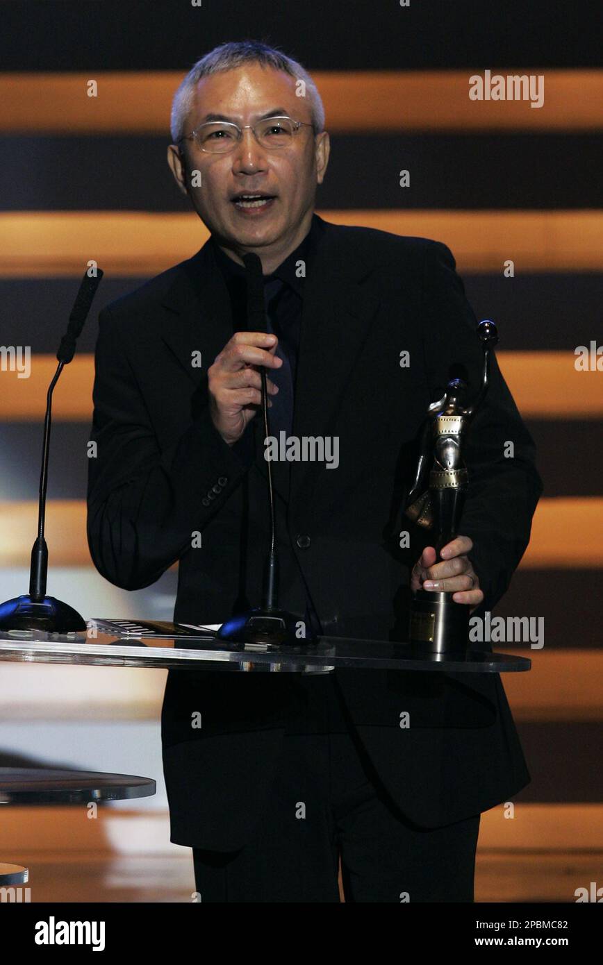 Hong Kong director Patrick Tam Ka Ming speaks after receiving his ...