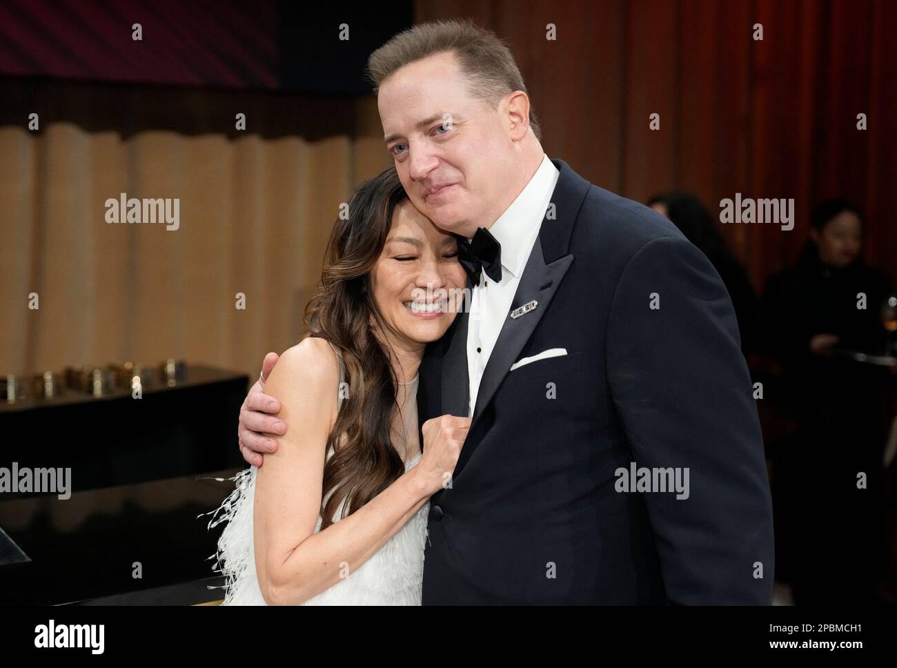 Michelle Yeoh, left, and Brendan Fraser pose at the engraving station ...