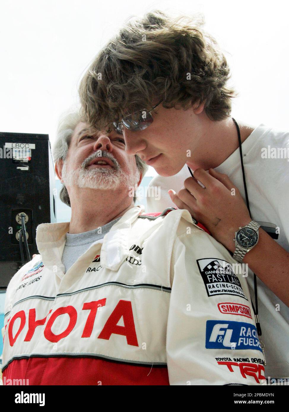 Movie magnate George Lucas, left, and his son Jett share a moment in ...