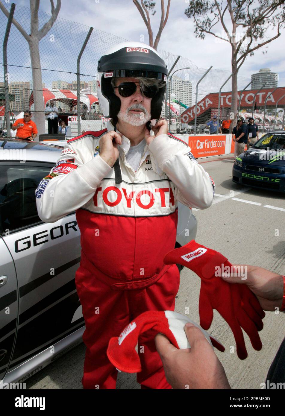 Movie magnate George Lucas gets ready to start in a race-prepared ...