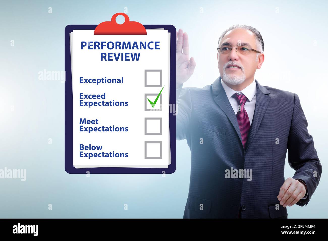 Annual performance review concept with the businessman Stock Photo - Alamy