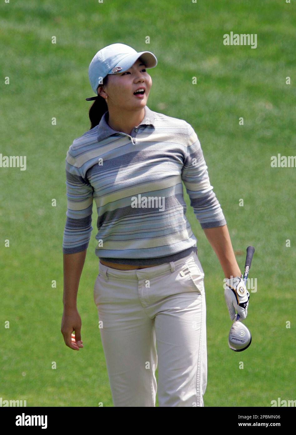 Na Ri Kim of South Korea, watches her shot from the fairway on the 17th ...