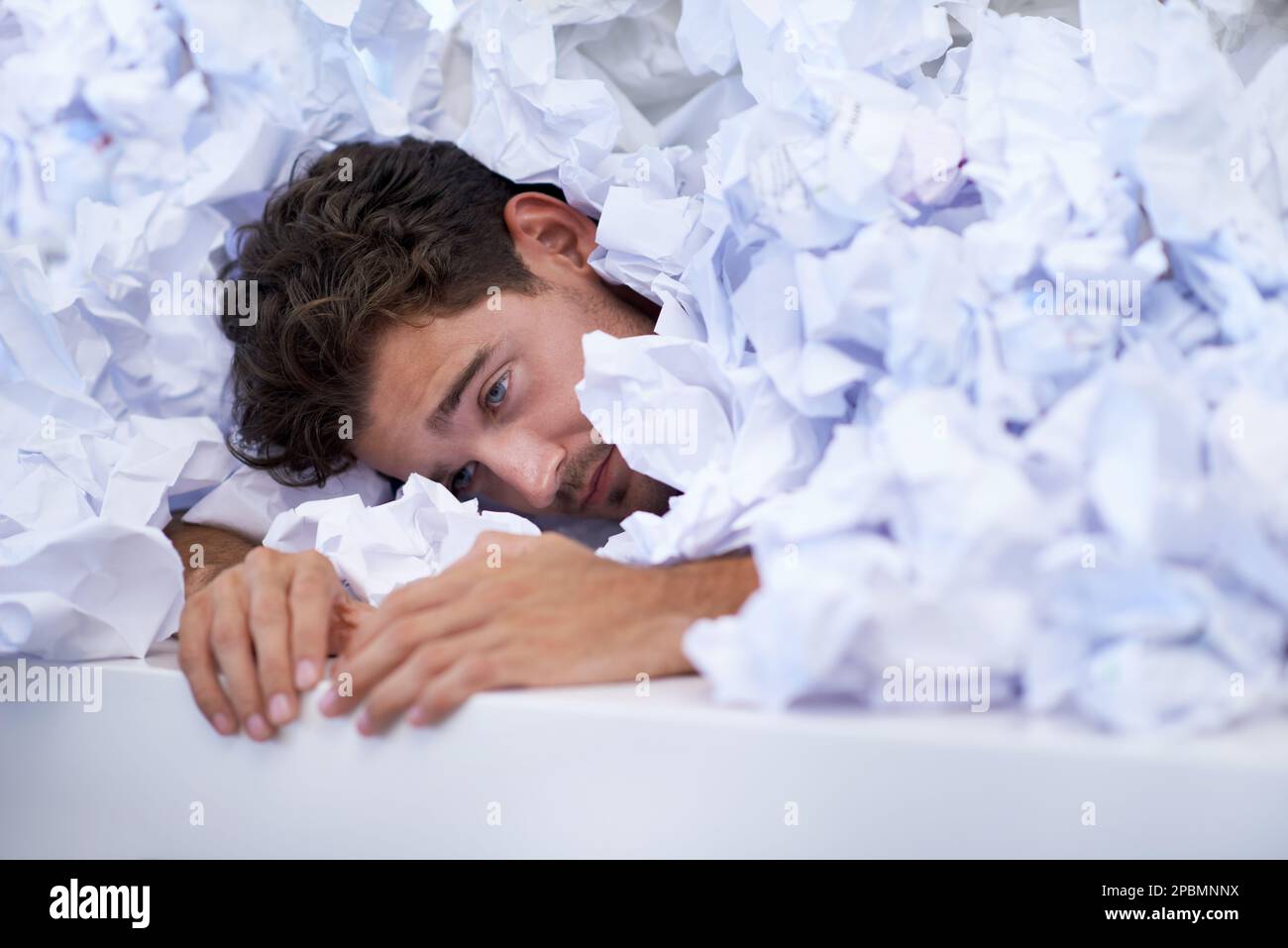 Buried under paperwork hi-res stock photography and images - Alamy