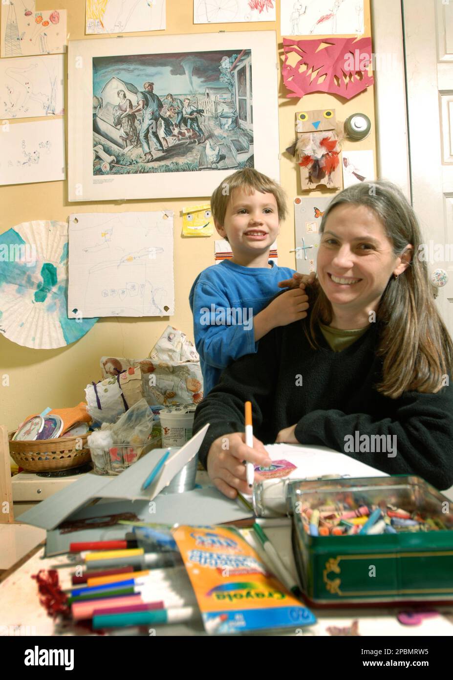 ** ADVANCE FOR WEEKEND EDITIONS APRIL 13-14 ** Surrounded by artwork ...