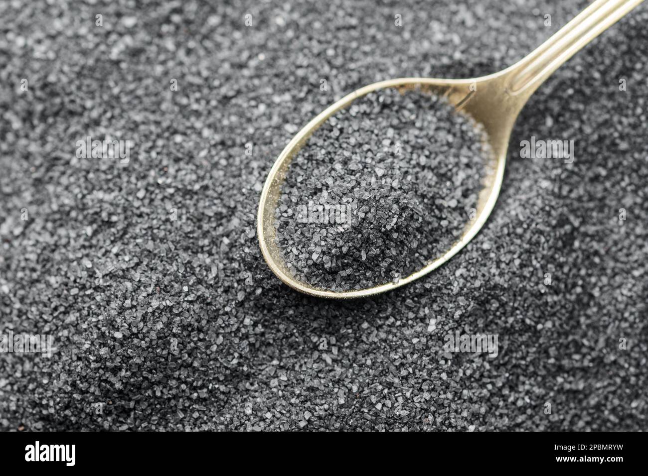 Hawaiian black lava sea salt . Healthy food concept. Speciality salt ...