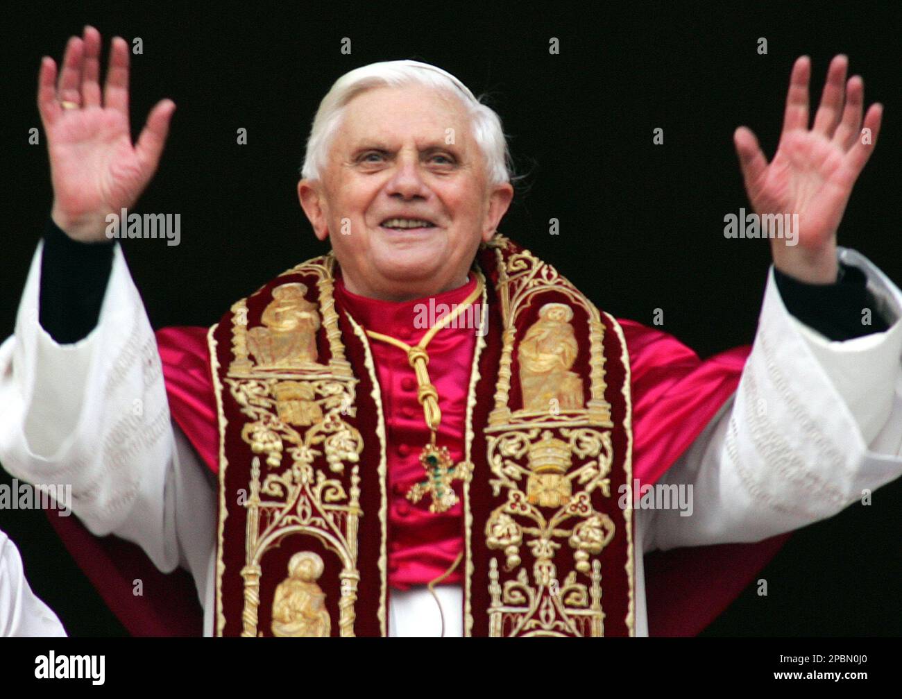 ** FILE ** Newly elected Pope Joseph Ratzinger of Germany waves to the ...