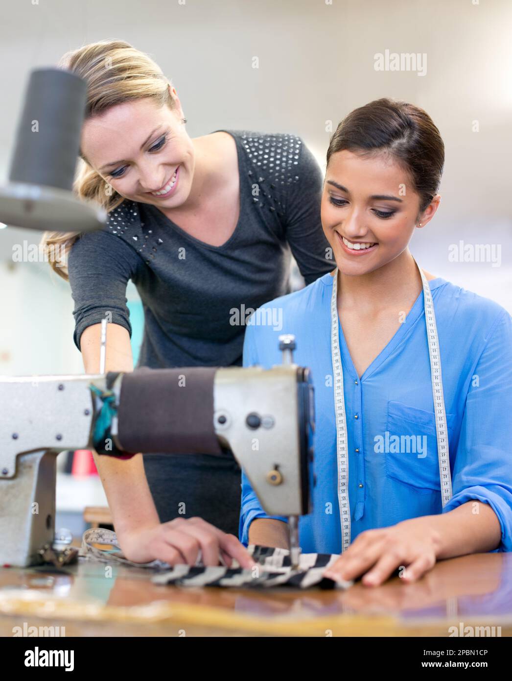 Creative design partnership. two young women working on a new design ...