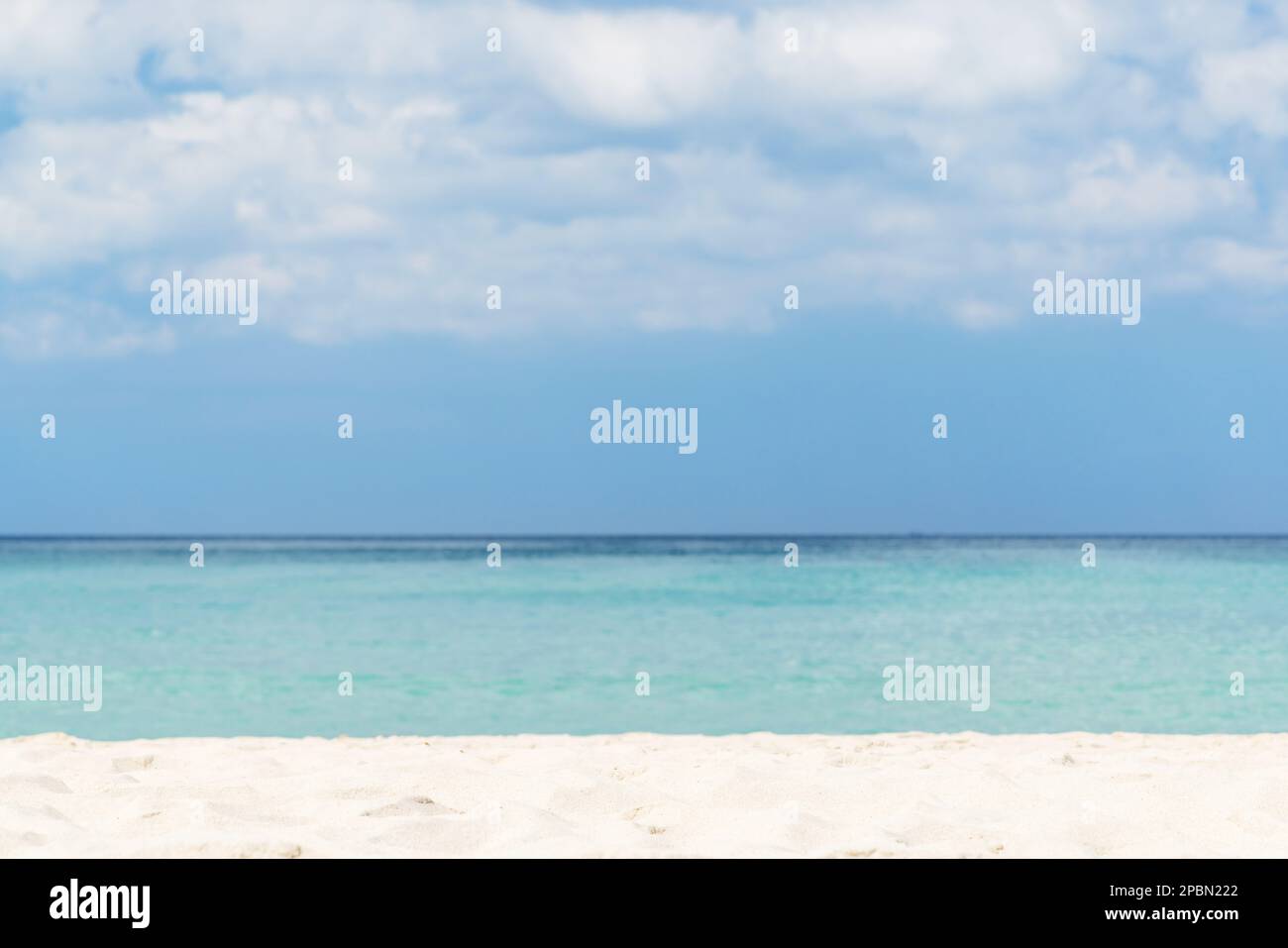Bright sand beach, sea and beautiful sunny sky with clouds. Travel ...