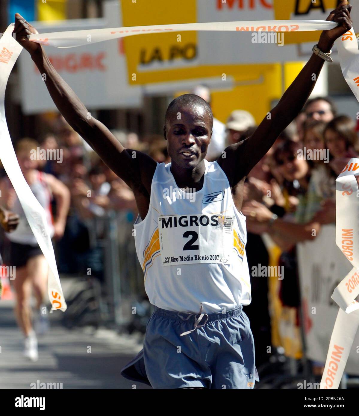 Edwin Soi from Kenya crosses the finishing line to win the 10km street ...