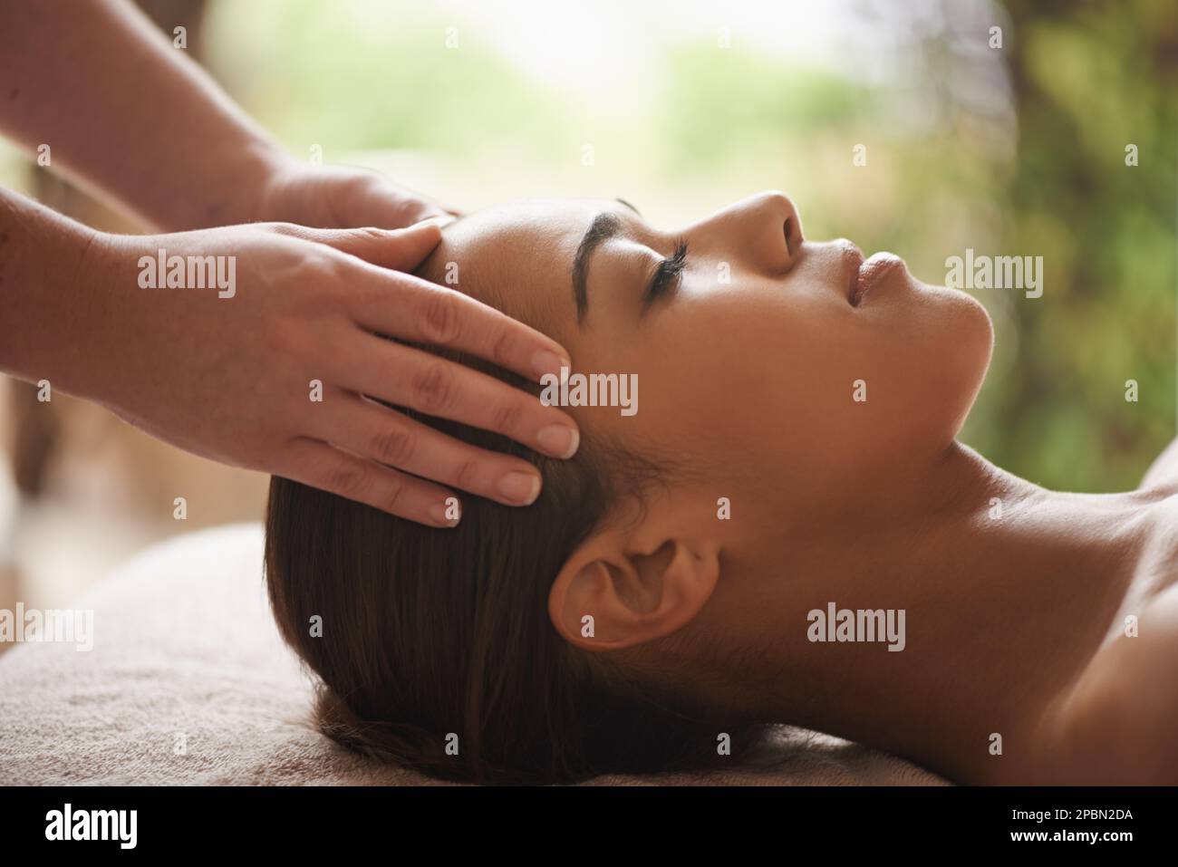 Where Stress Ends And Relaxation Beginsa Beautiful Young Woman Getting A Head Massage At A