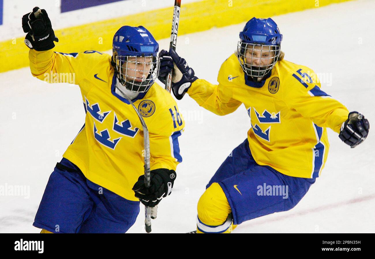Team Sweden's Pernilla Winberg (16) and Katarina Timglas (15) celebrate ...