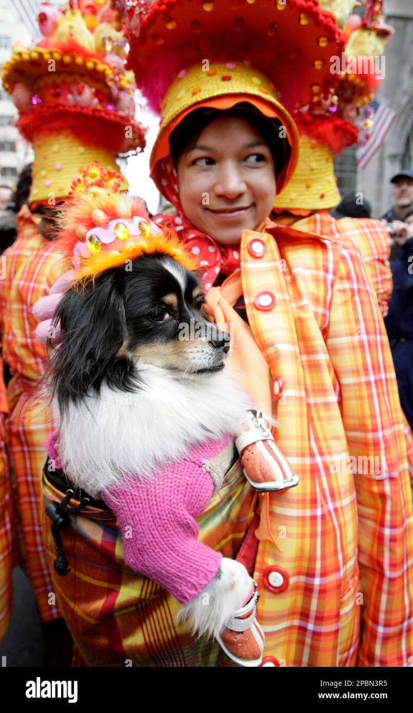 Jessica Marrero and and Emmett pose for pictures during 5th Avenue ...