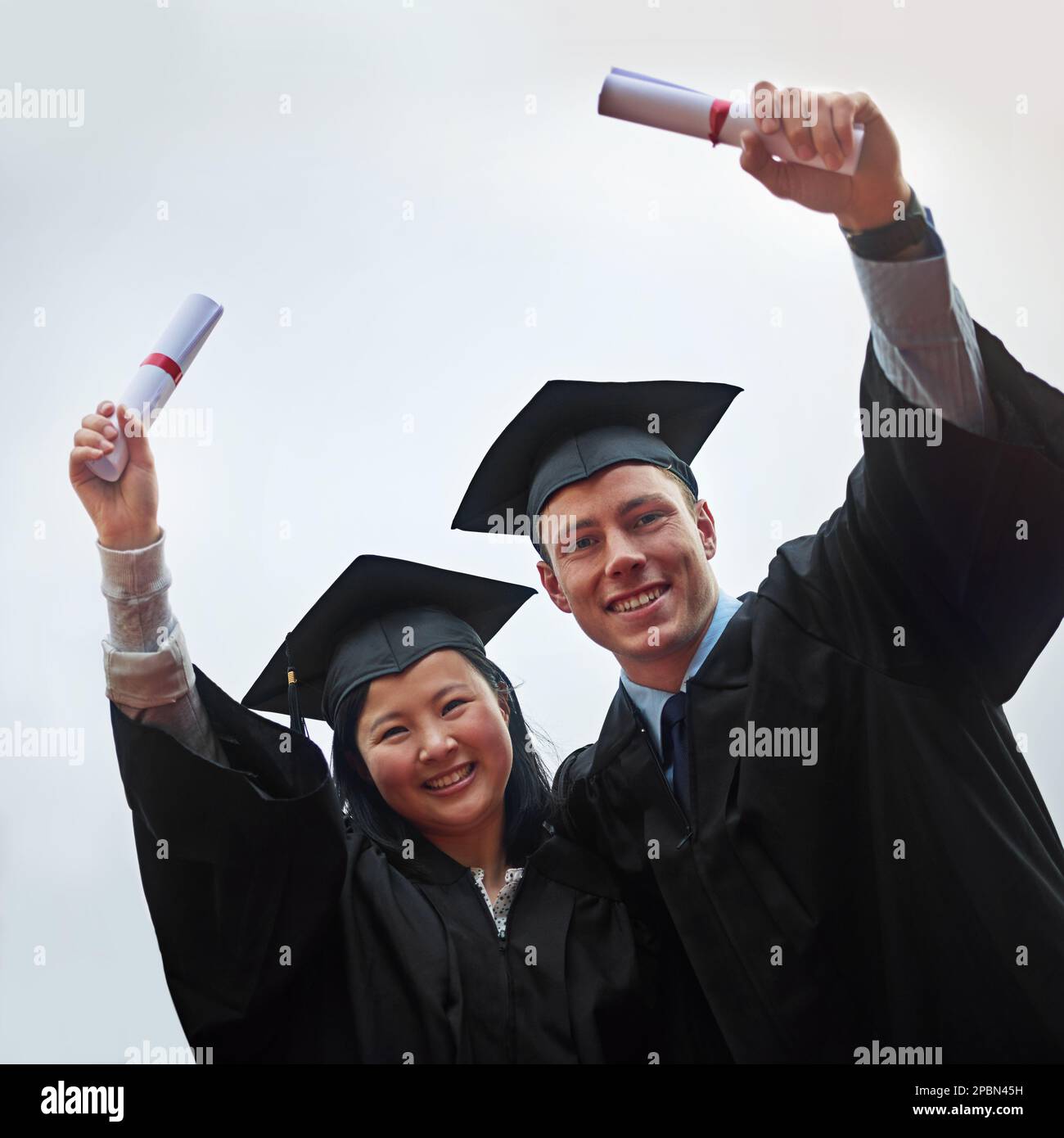 Celebrating graduation diverse friends hi-res stock photography and ...