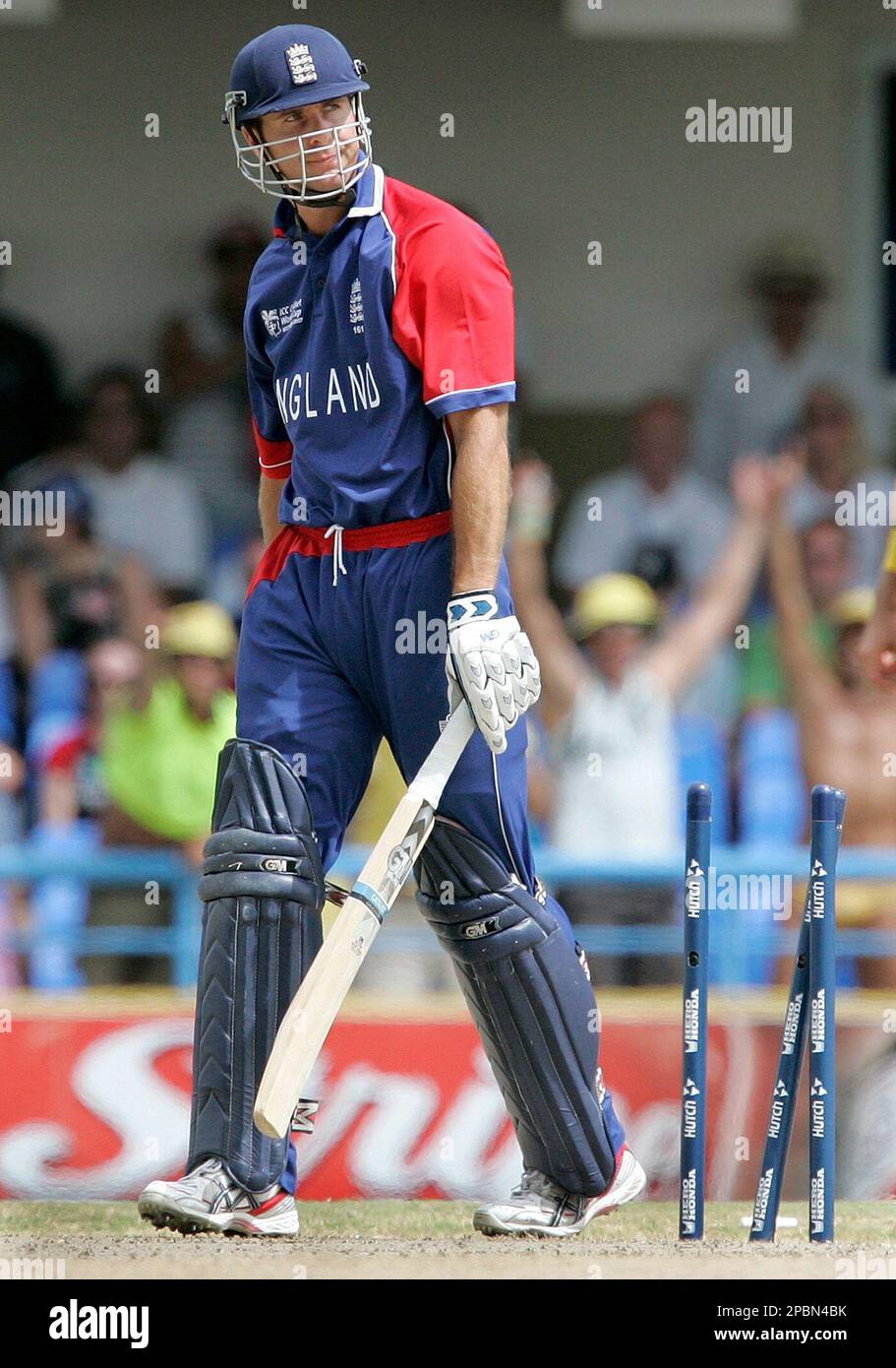 England captain Michael Vaughan makes his way back to the pavilion ...