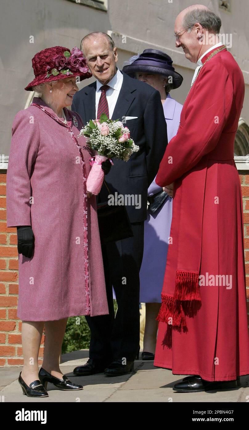 Britain's Queen Elizabeth II and The Duke of Edinburgh talk to The ...