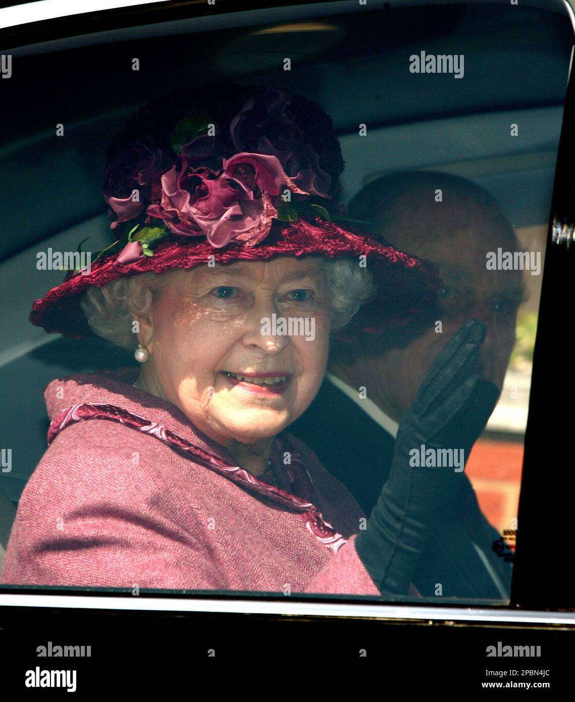 Britain's Queen Elizabeth II is driven away from St George's Chapel at ...