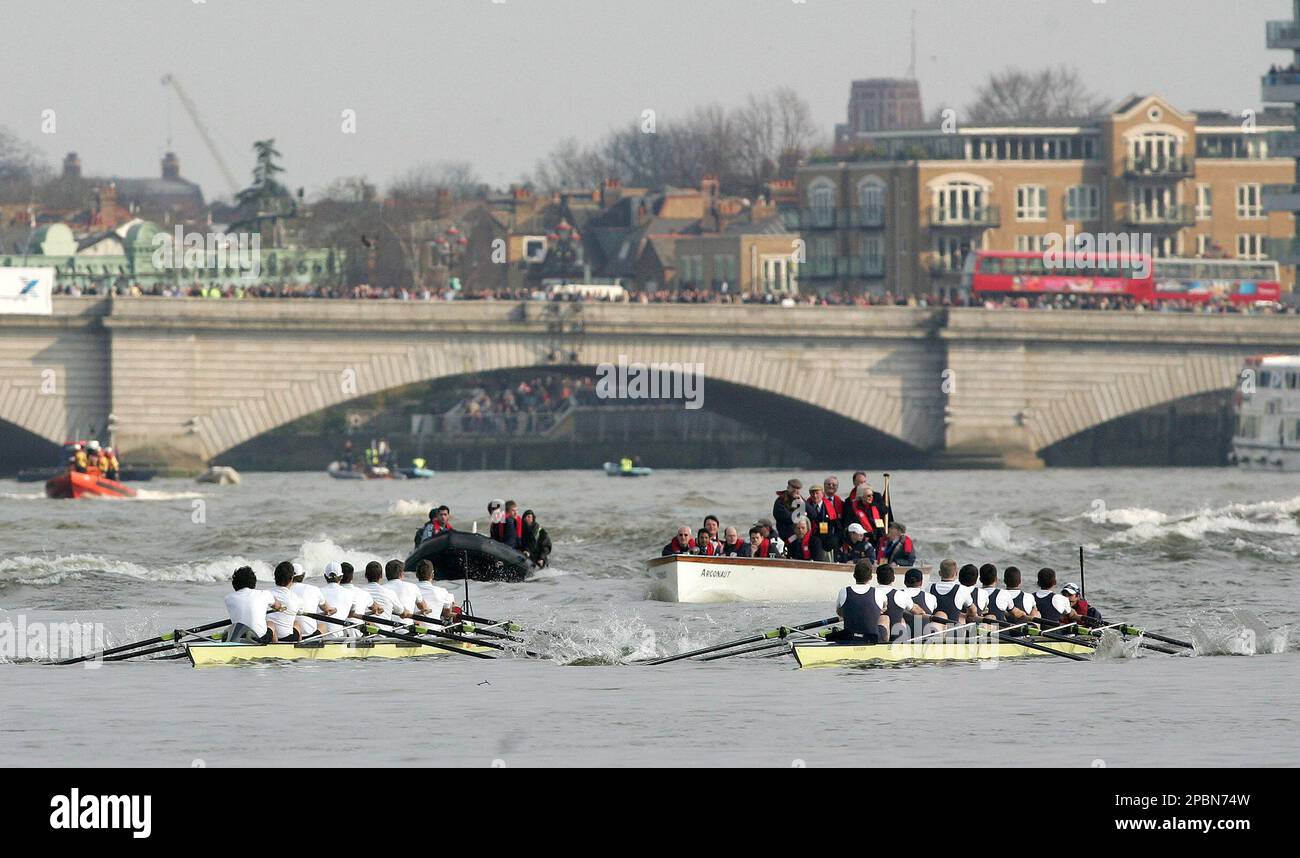 Cambridge University rowing crew, left, races with Oxford University ...