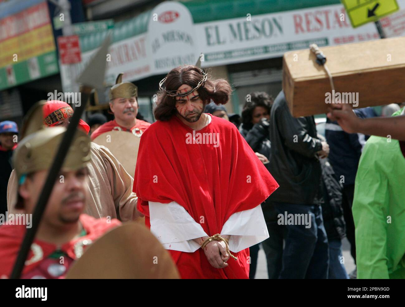 Jesus Christ, played by Rafael N.Gonzalez, is led through the streets ...
