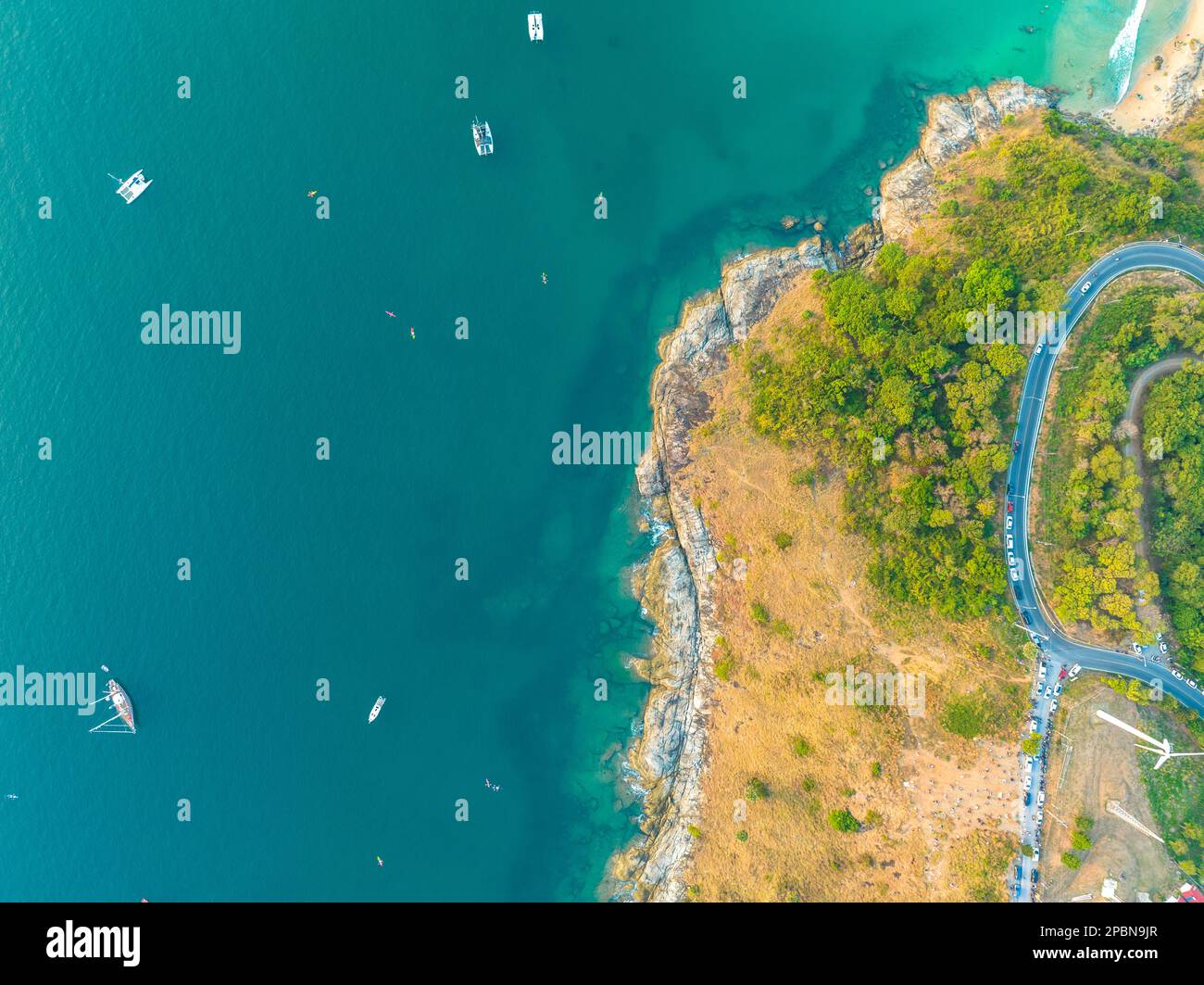 aerial top view The road around Phuket beach on the high mountain winds ...