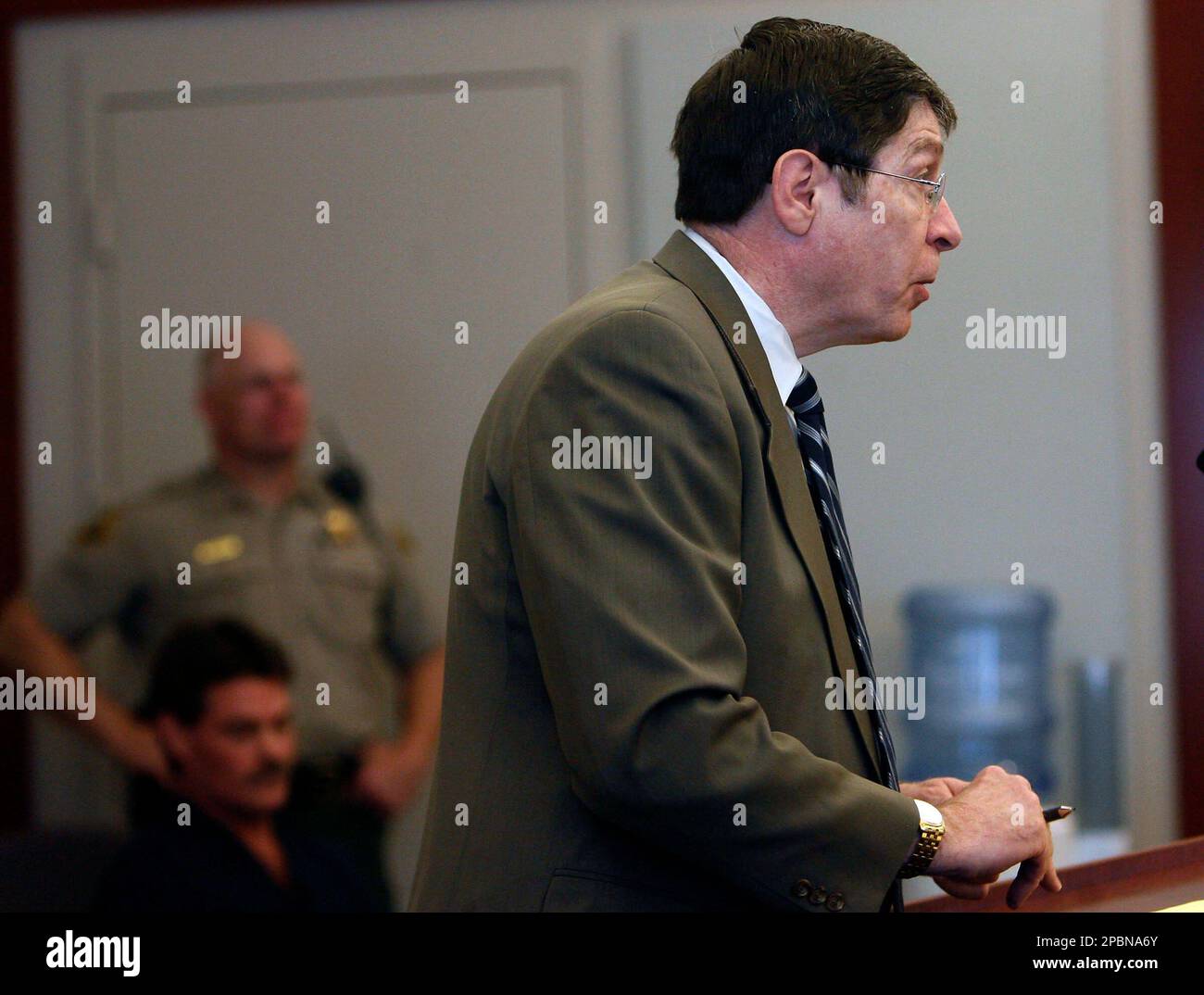 Prosecutor Kent Morgan questions a witness during the preliminary ...