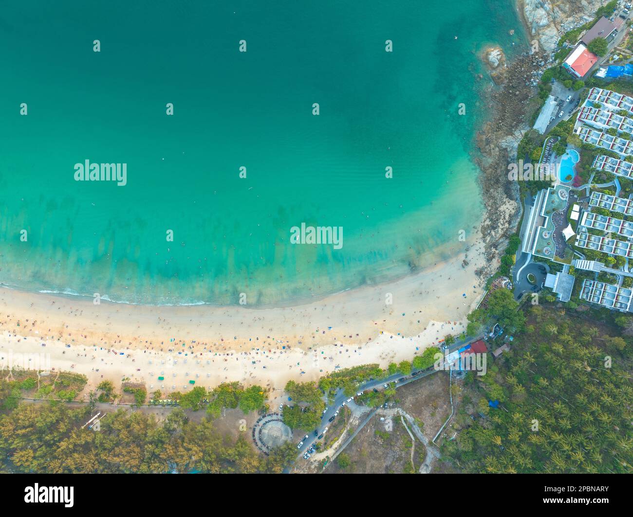 aerial top view above white sand beach. beach crowded with tourists ...