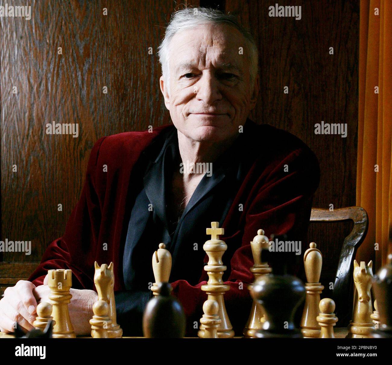 Hugh Hefner poses at the Playboy Mansion in Los Angeles on Thursday ...