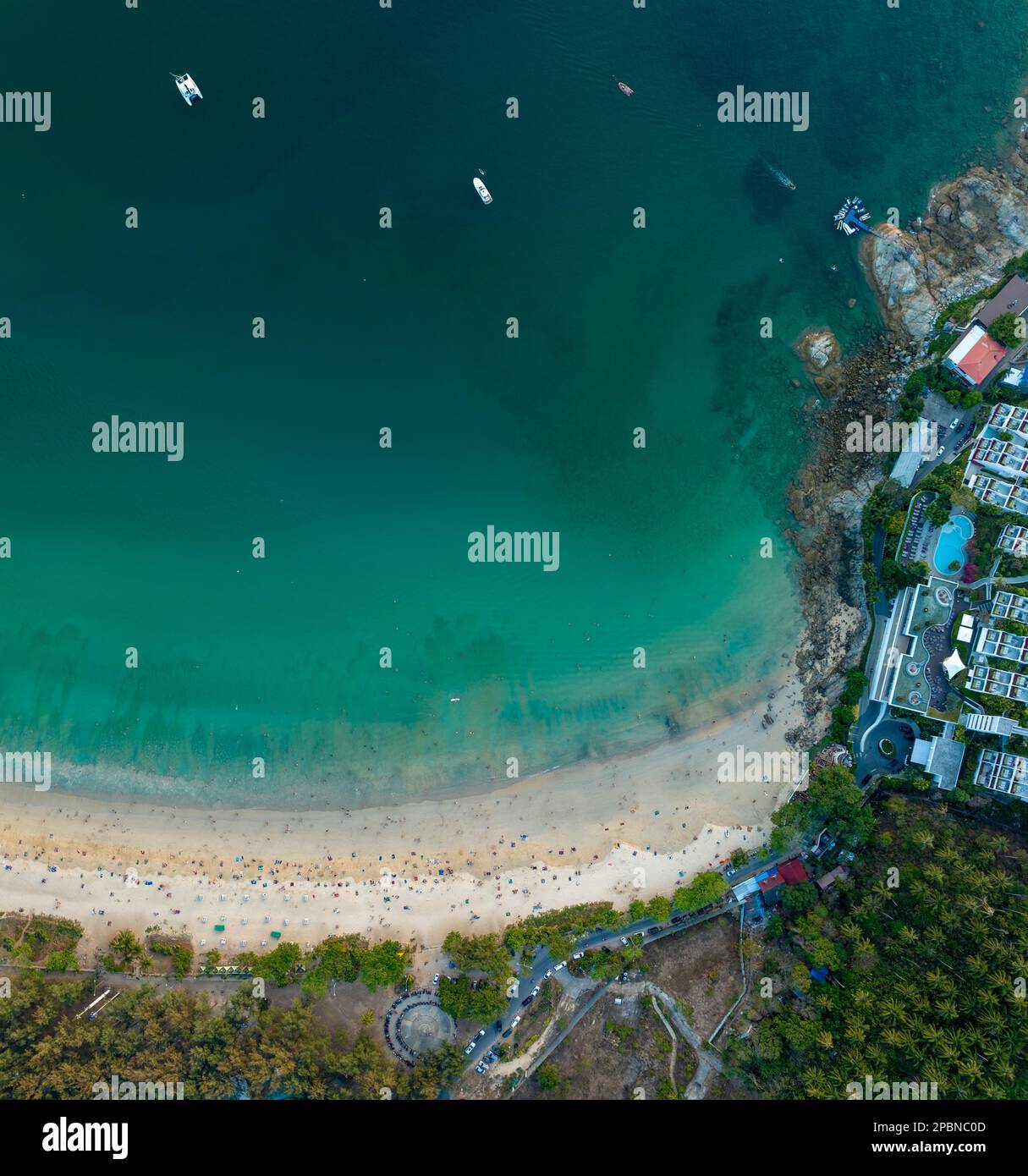 aerial top view above white sand beach. beach crowded with tourists ...