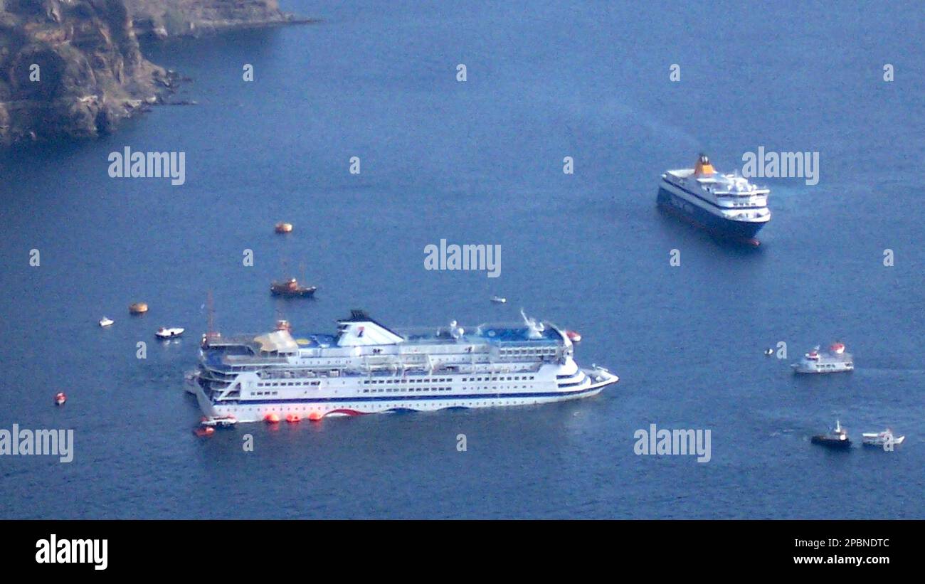 The listing cruise ship 'Sea Diamond' carrying nearly 1,200 passengers ...
