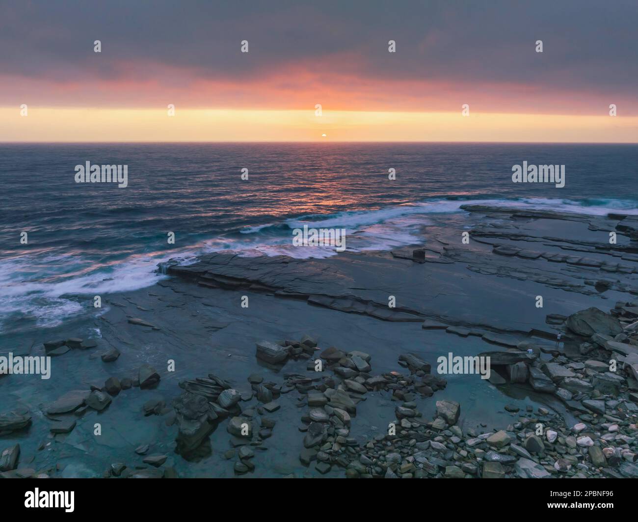 Aerial sunrise seascape with haze and clouds from The Skillion in Terrigal, NSW, Australia Stock ...