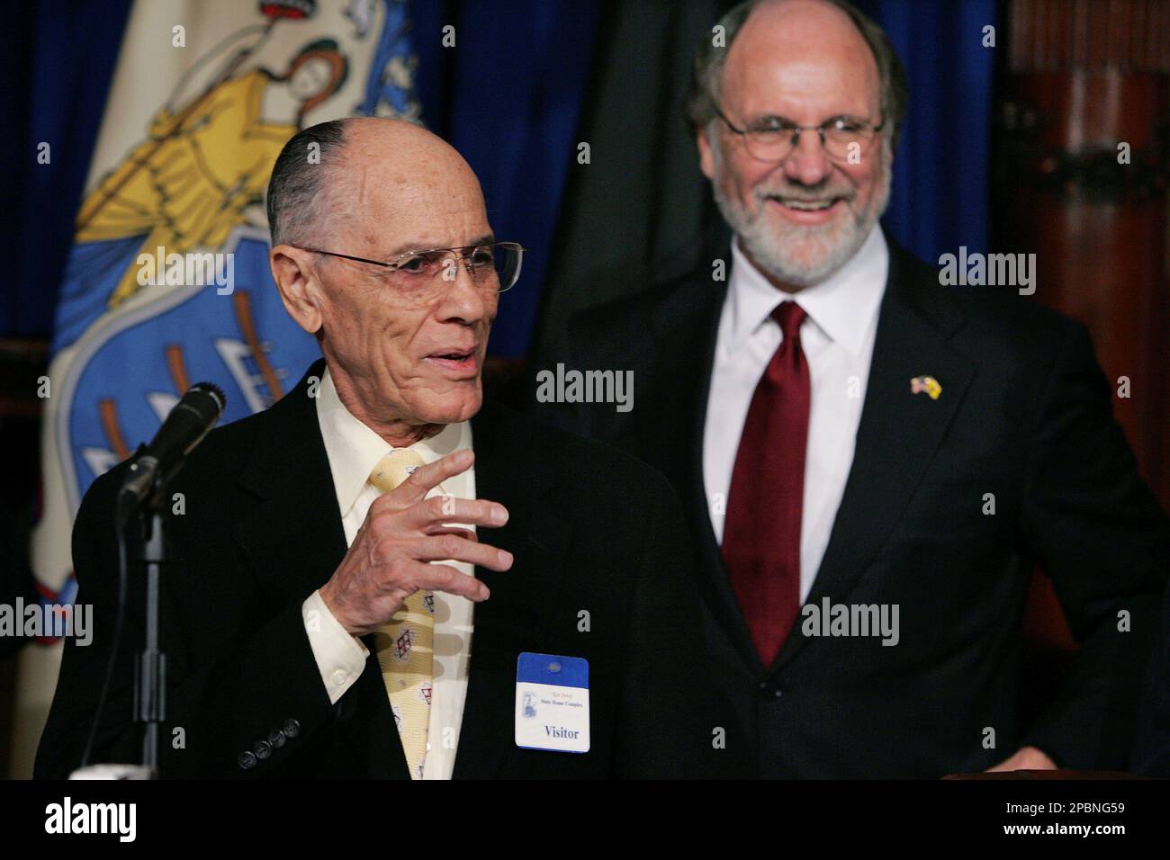 New Jersey Gov. Jon S. Corzine smiles as Dr. Walter Alexander,left ...