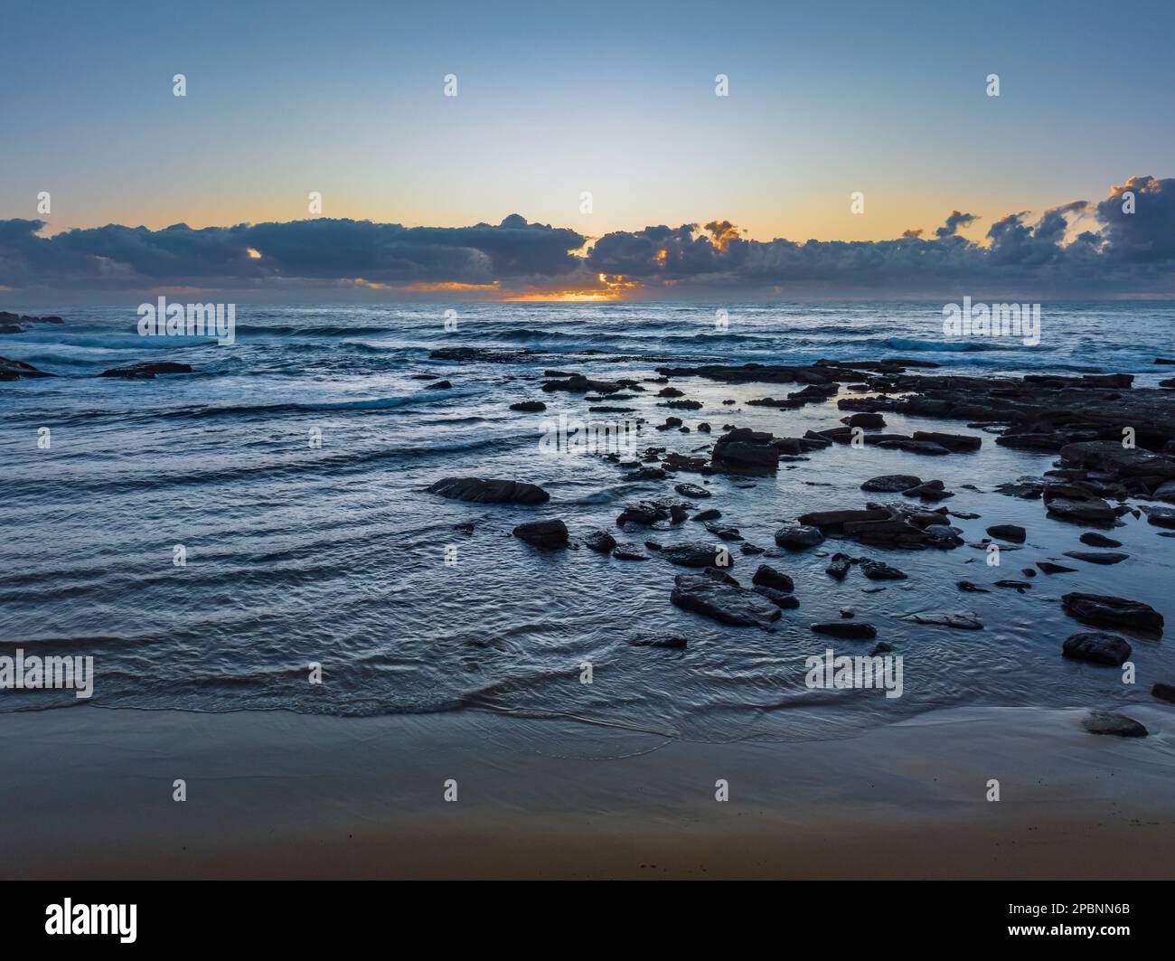 Aerial sunrise seascape with clouds at Spoon Bay in Wamberal on the ...