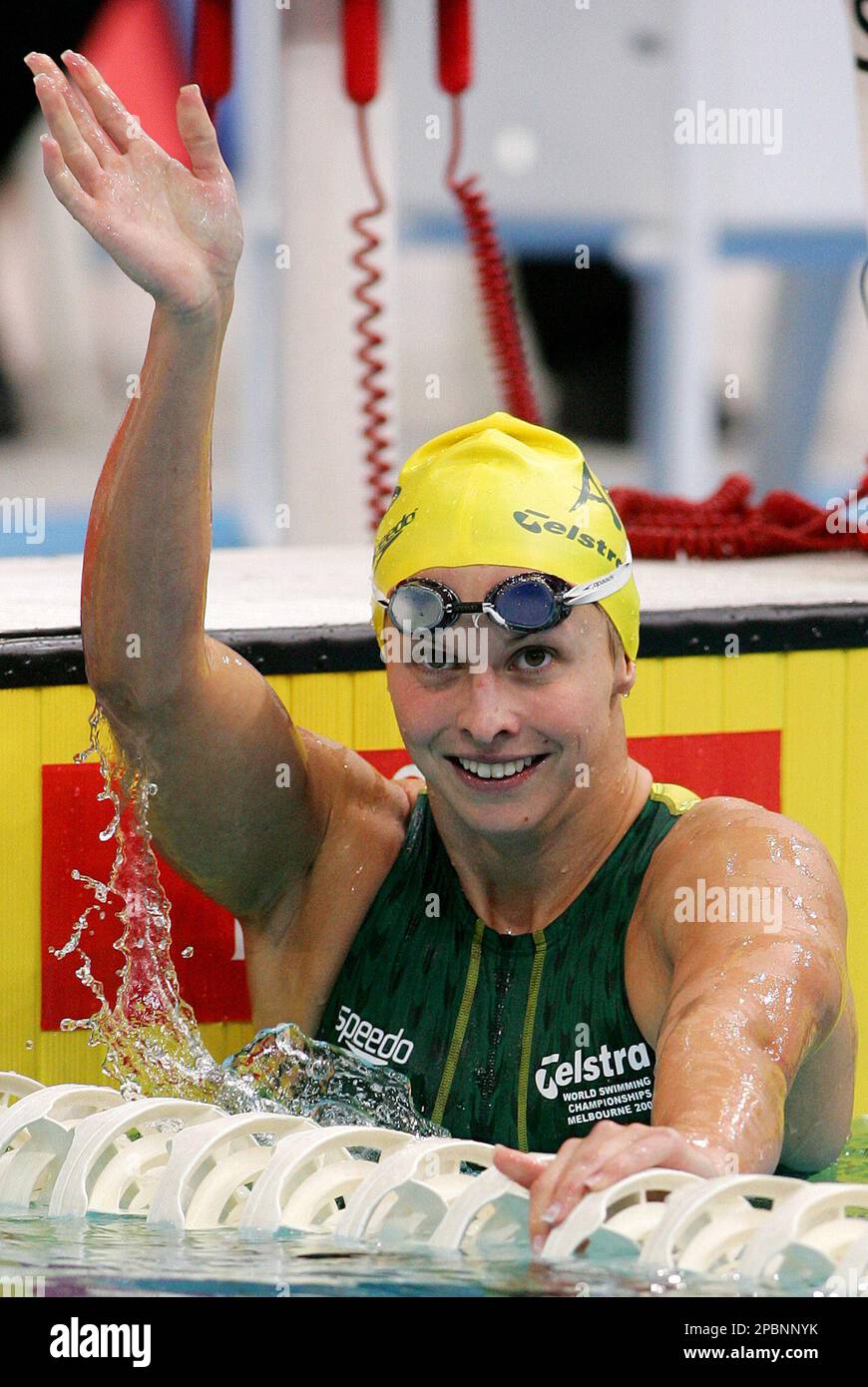 Australian Libby Lenton waves to the crowd after winning the 50m ...