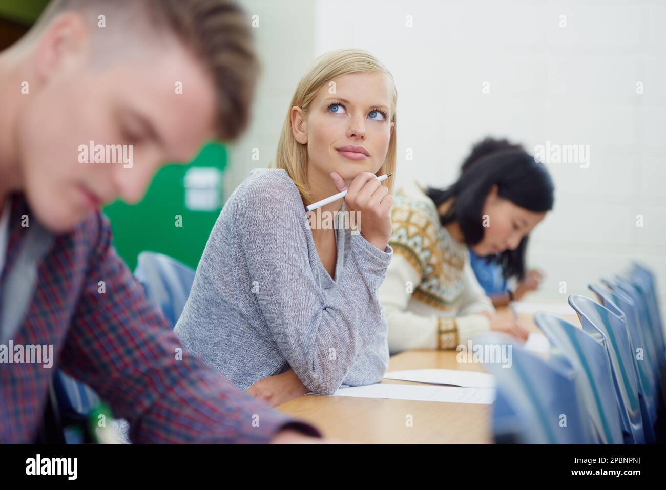 Think before putting pen to paper. a group of university students ...