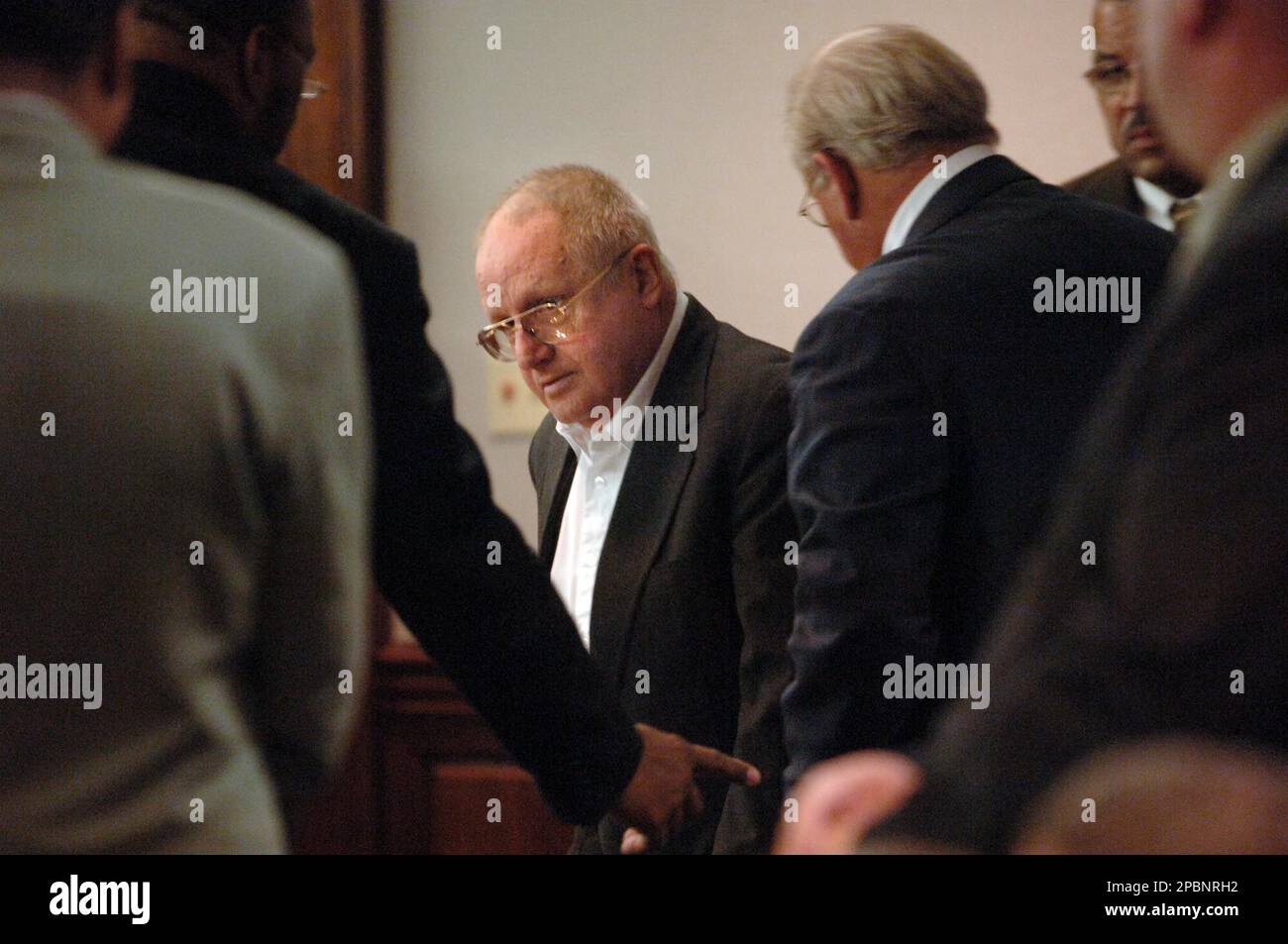 David Edenfield, center, enters the courtroom for his arraignment in ...