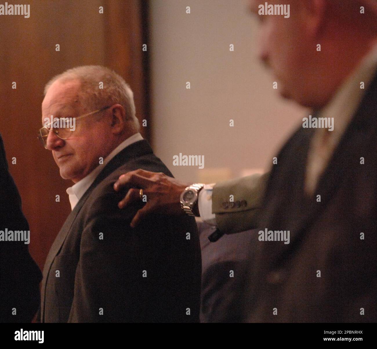 David Edenfield, center, enters the courtroom for his arraignment in ...