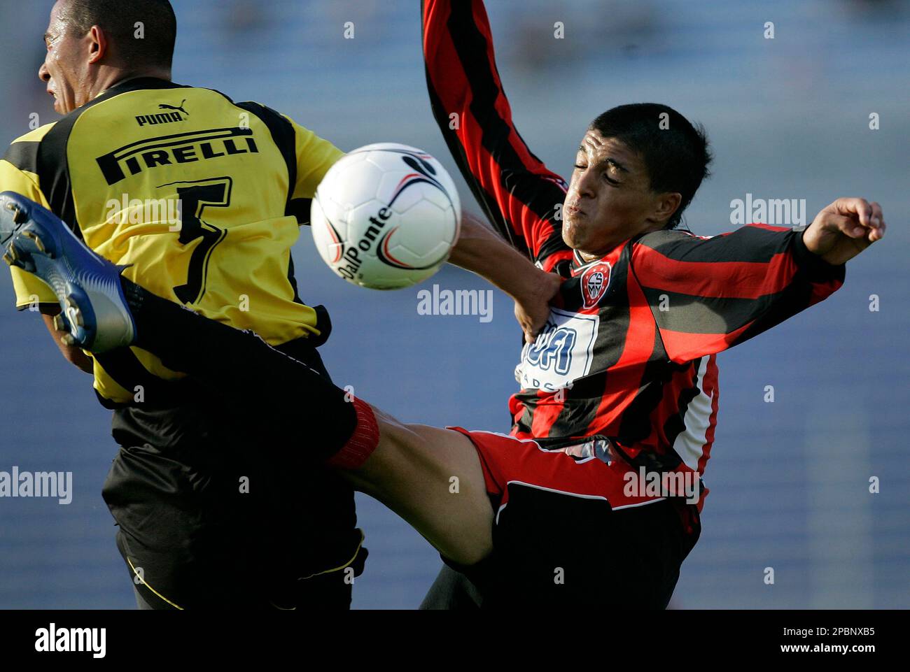 Uruguay's Penarol's Egidio Arevalo Rios, left, battles for the ball ...