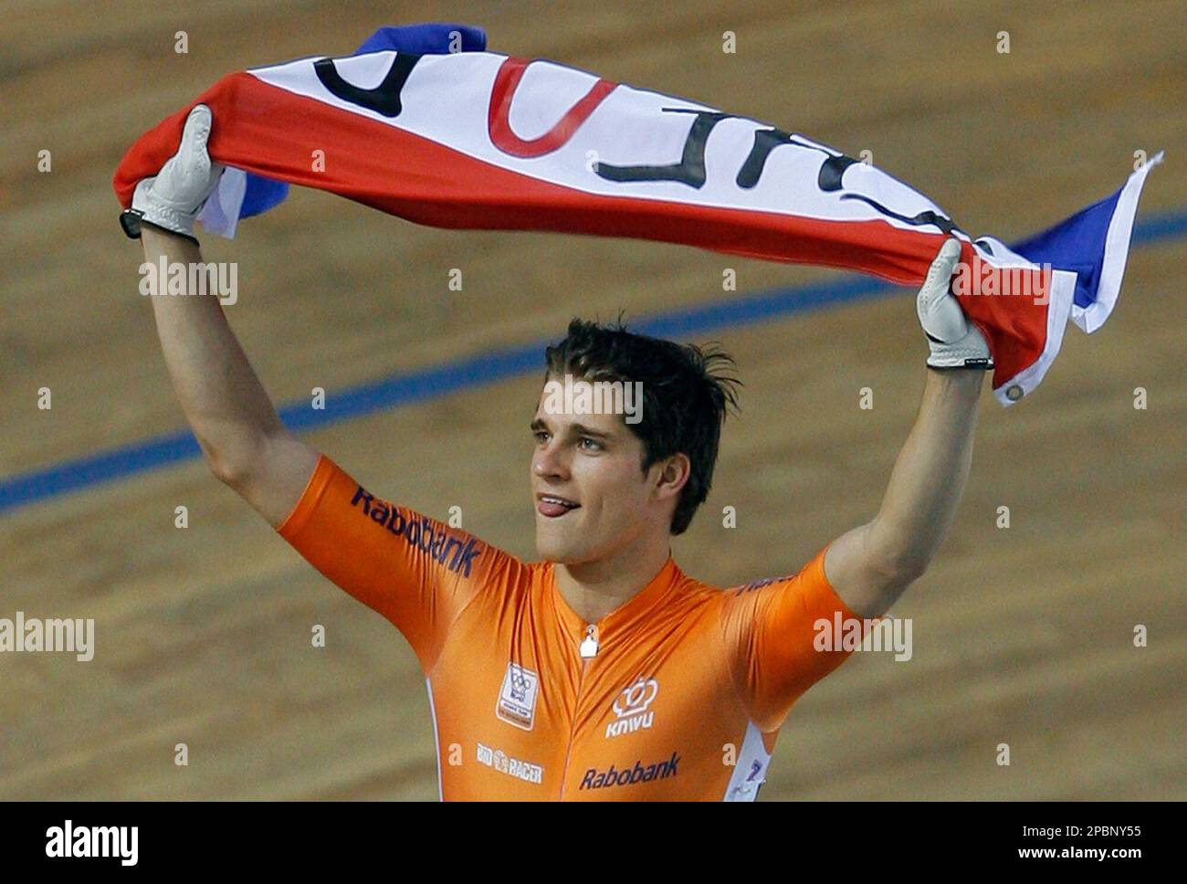 Dutch cyclist Theo Bos celebrates after winning the Men's Sprint gold ...