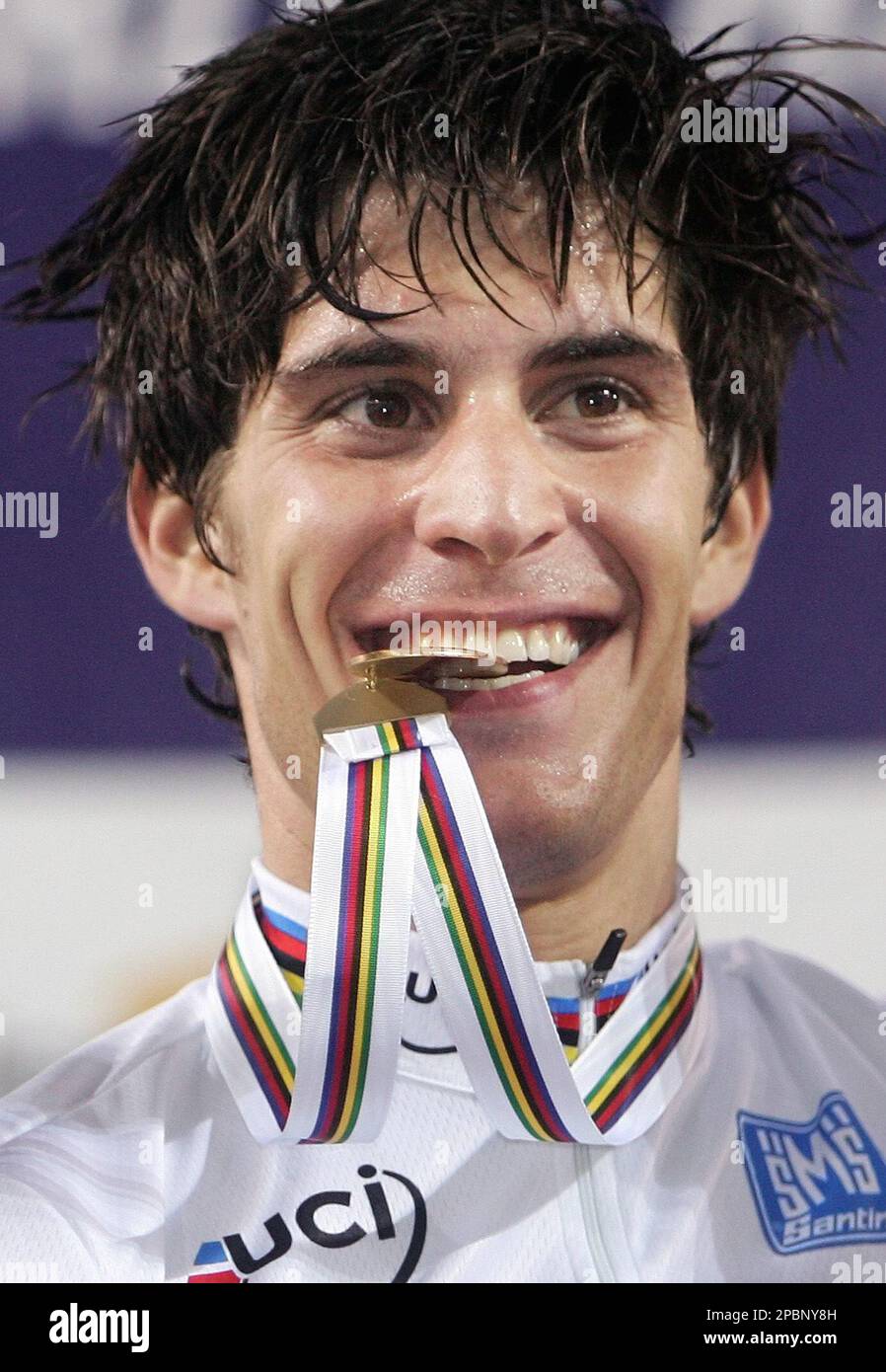 Swiss cyclist Bruno Risi celebrates after he and his partner Franco ...