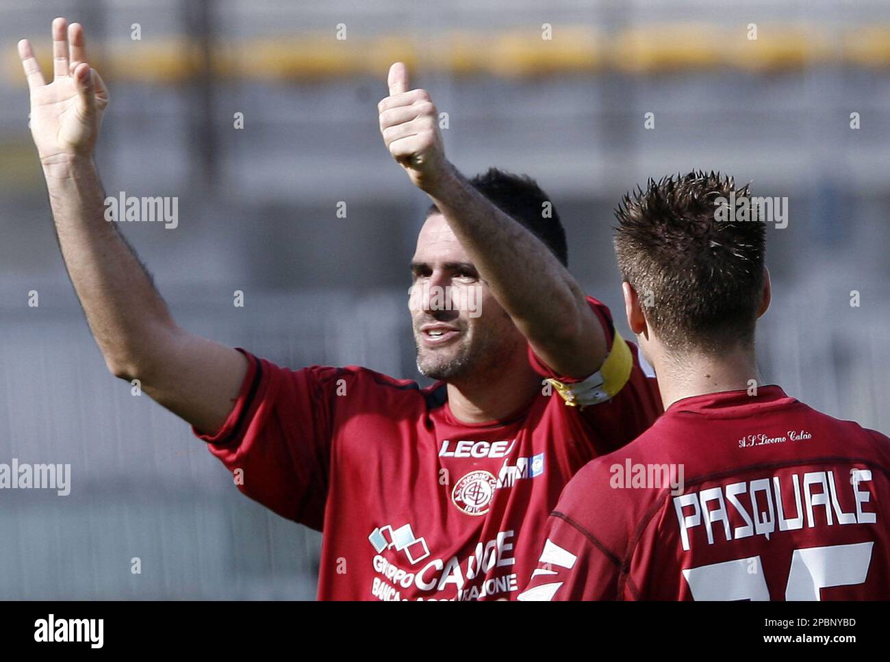 Livorno's Cristiano Lucarelli, back, left, celebrates after scoring ...
