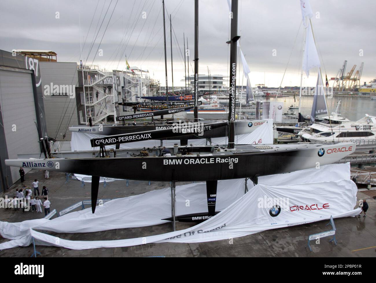The yachts of US team BMW Oracle Racing are unveiled during a ceremony ...