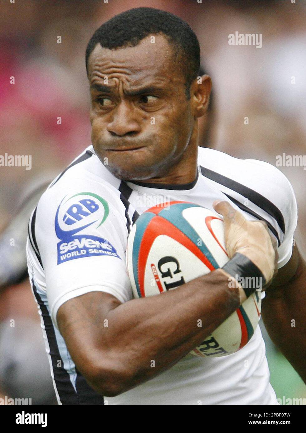Fiji's Setefano Cakau runs for a try against New Zealand in the semi ...