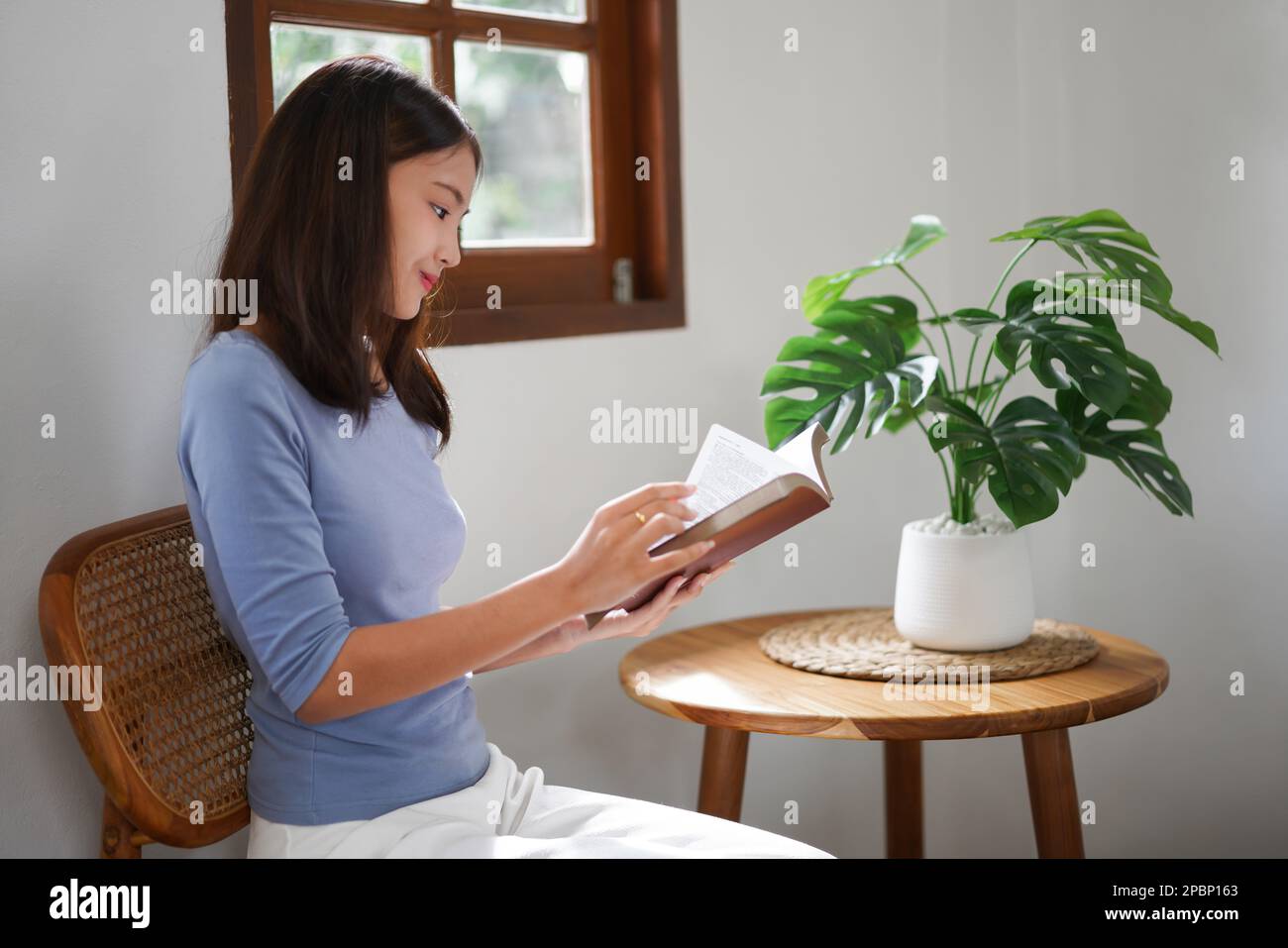 Work from home concept, Business women is sit beside the window to ...