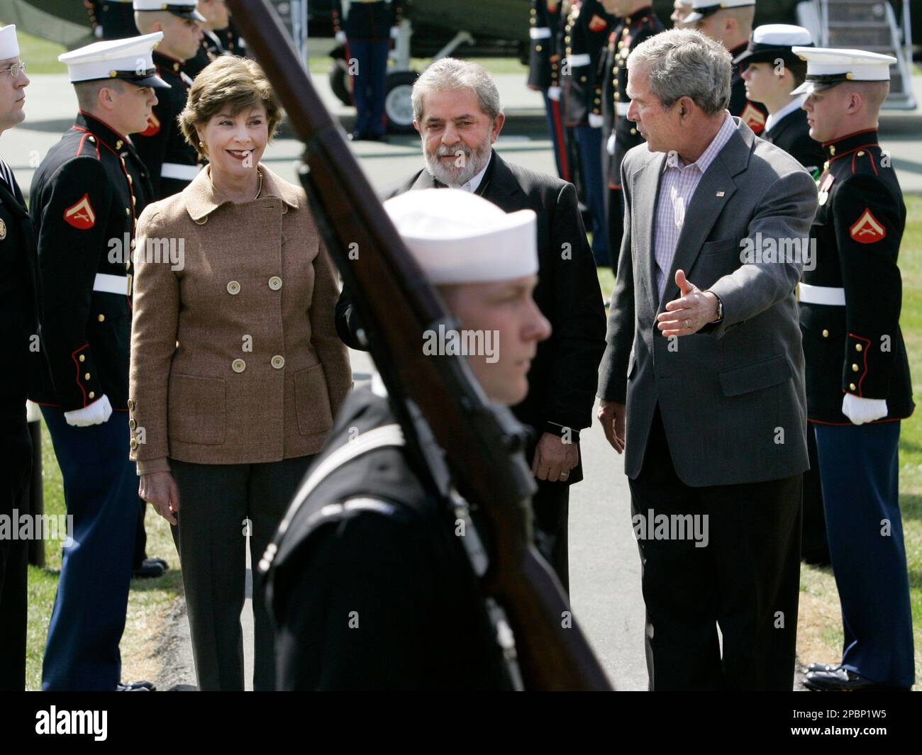 President Bush and first lady Laura Bush greet Brazil's President Luiz ...