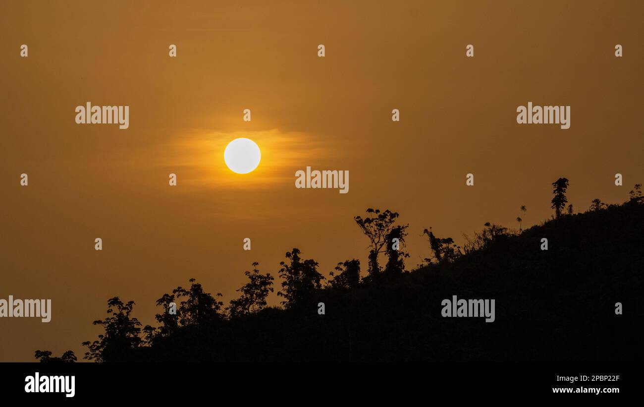 Beautiful sunrise view. Clouds on one side and the sun rising over the ...
