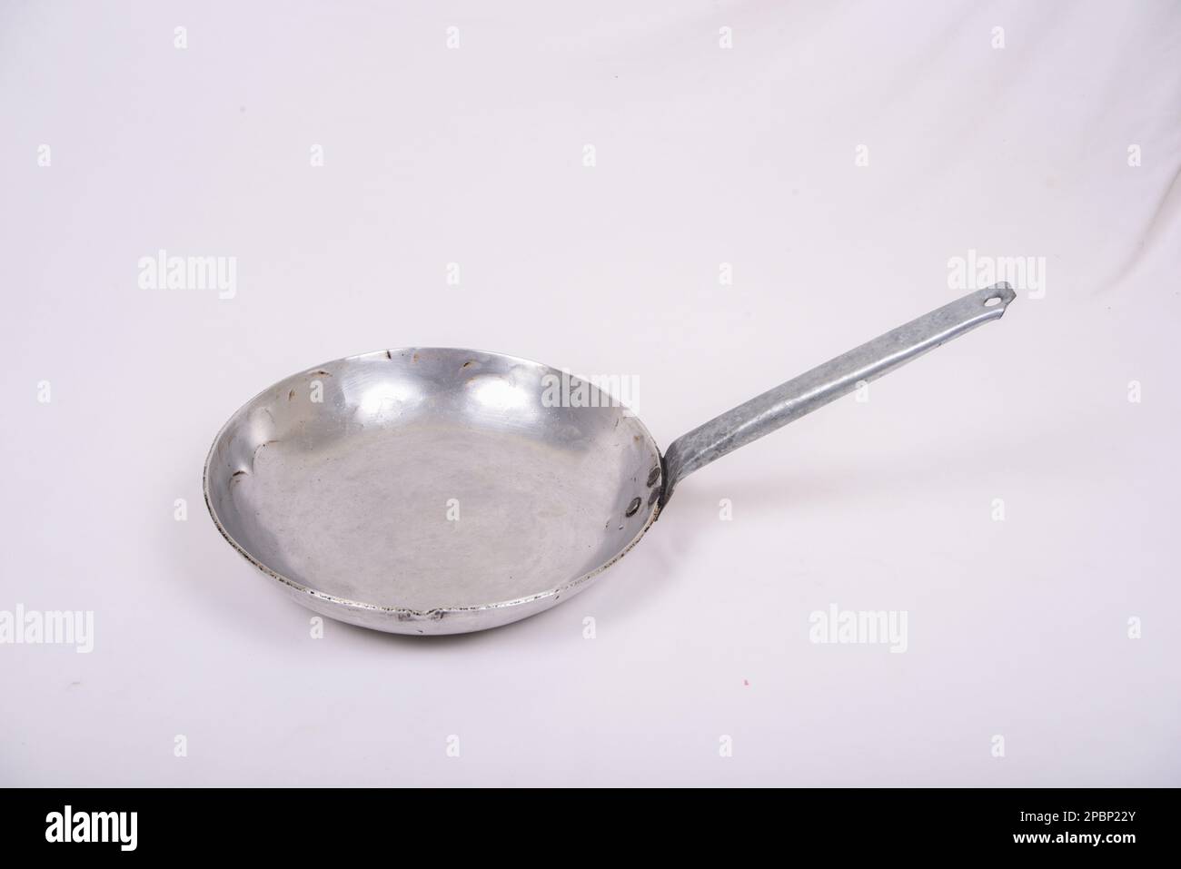 stainless steel pans on isolated background Stock Photo - Alamy
