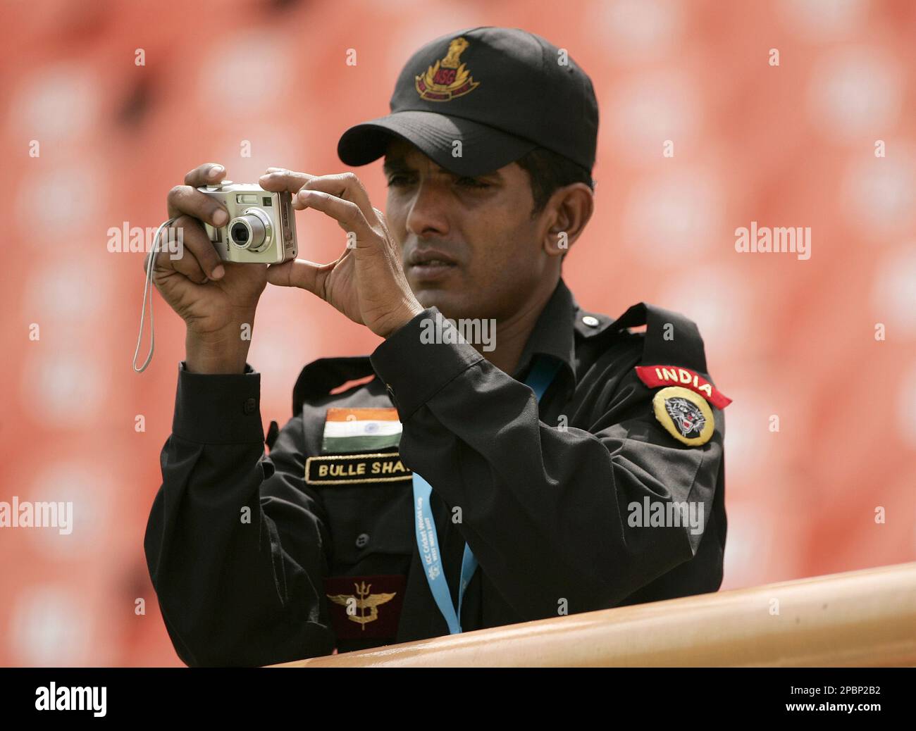 An Indian National Security Guard commando take the picture of Sri ...