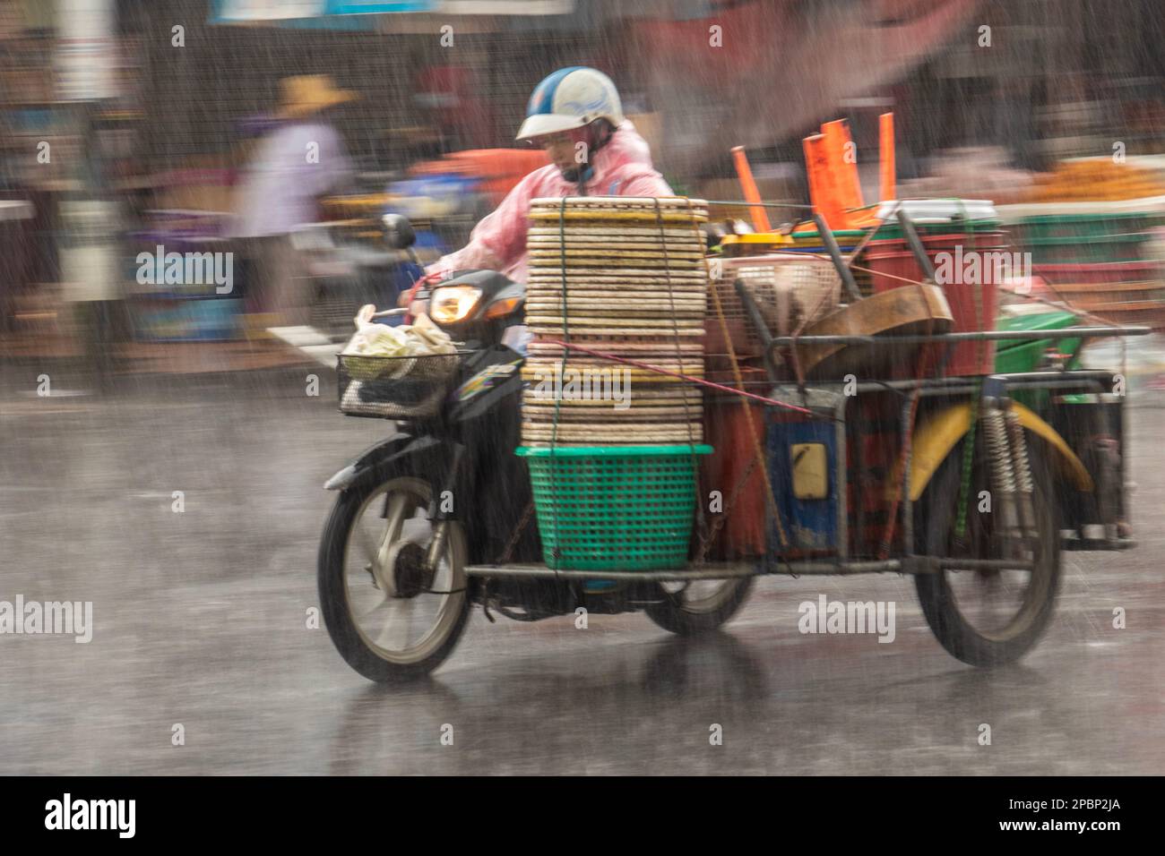 Women selling helmets hi-res stock photography and images - Alamy