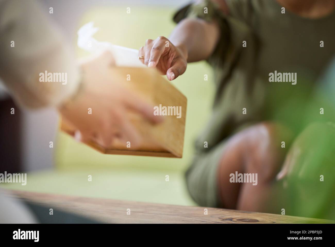 Therapist hand, tissue box and black woman at therapy consultation for ...