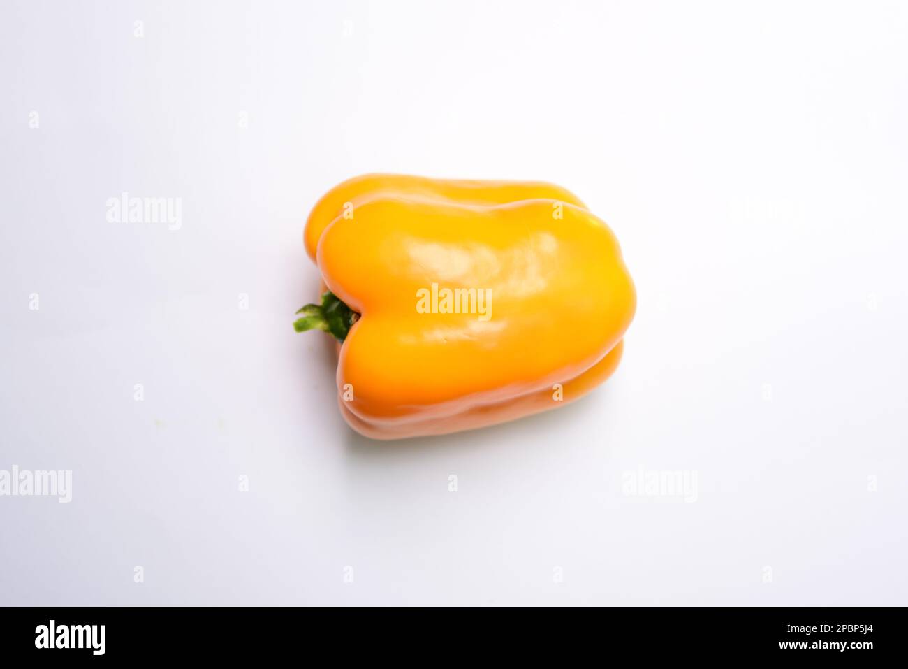 yellow ball pepper in an isolated white background Stock Photo - Alamy